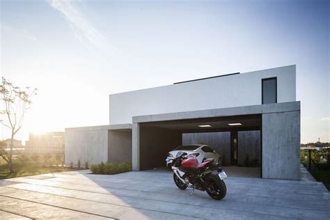 Modern House N With Motorcycle Parked Outside