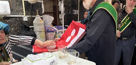 نسیم پرطراوت پرچم سرخ حرم مطهر حسینی در بیمارستان شهید مدنی تبریز