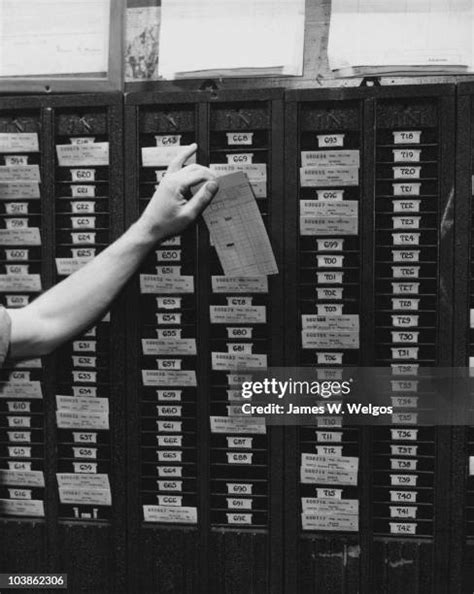 Factory Time Clock Photos And Premium High Res Pictures Getty Images