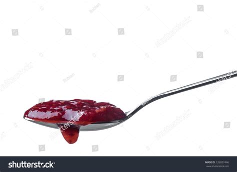 Raspberry Jam Dripping From A Spoon Isolated On White Background Stock
