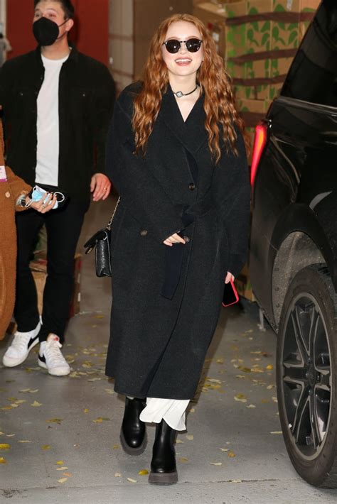 Sadie Sink Gets Cozy In Black Coat And Leather Lug Sole Ankle Boots