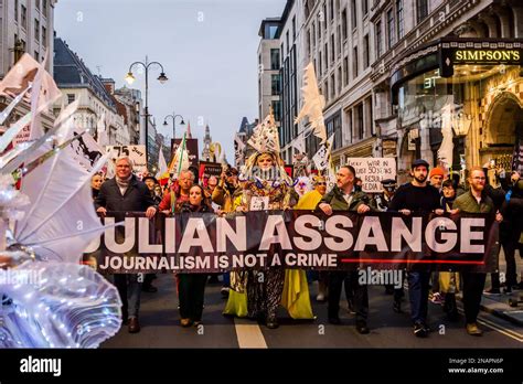 Supporters Of Wikileaks Founder Julian Assange Hold A Night Carnaval