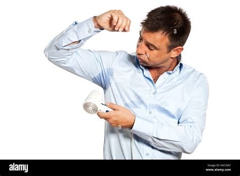 One Caucasian Man With Sweat Stain Perspire Drying Shirt With Hair
