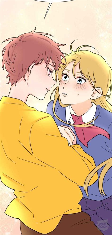 Two Anime Characters One Is Kissing The Other Has Blonde Hair And Blue