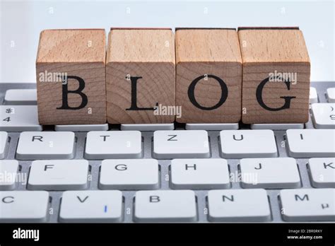 Wooden Cube Block With Blog Text On White Keyboard Stock Photo Alamy