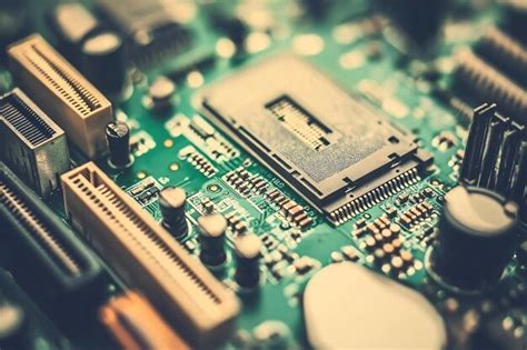 Closeup Of A Motherboard Showing Complex Electronic Components