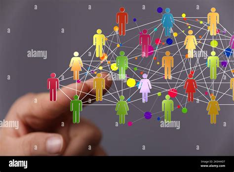 A Hand Touching Colorful 2d Rendered People Icons Neural Network And
