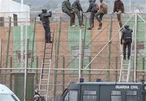 Migrants Storm Moroccan Border At Spains Ceuta Enclave Video