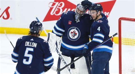Jets Sign Connor Hellebuyck Mark Scheifele To Identical Seven Year