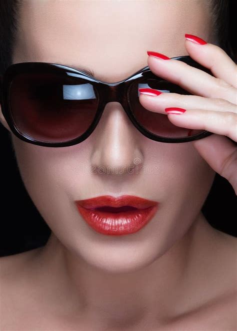 Close Up Of Glamorous Woman Wearing Sunglasses And Red Lipstick Stock