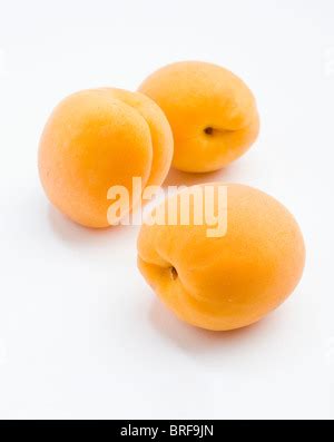 Apricots On White Background Stock Photo Alamy