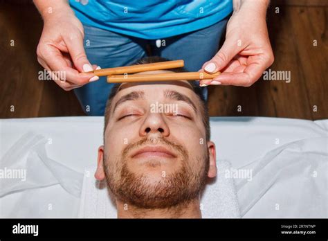 Wellness Concept Professional Masseur Gives A Man A Thai Facial