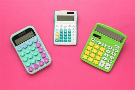 Premium Photo A Set Of Colorful Calculators On A Red Background