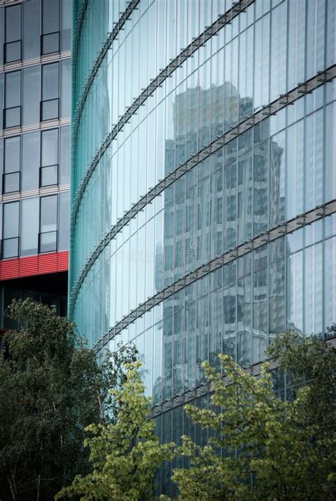 Glass Building Facade With Reflection And Trees Stock Image Image Of