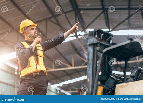 Smart Confident Young Teen Caucasian Worker In Warehouse Industry Store Manager Staff Standing