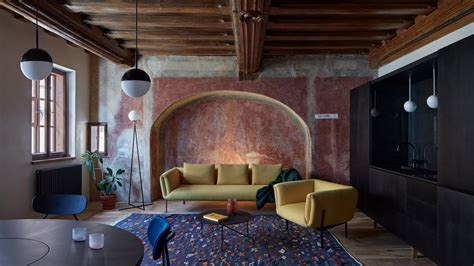 Ten Interiors Where Structural Beams Create Rhythm Across Ceilings