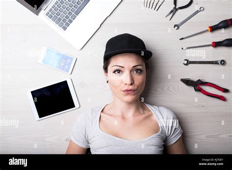 Woman Solving Every It Hardware And Software Problem With Her Black Hat
