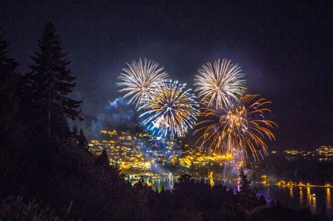 Premium Photo Firework Display Against Sky At Night