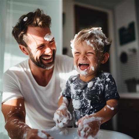 Premium Photo Father And Son Having Fun In A Bathroom
