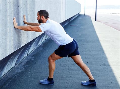 Wall Calf Stretches Calf Stretch With Hands Against Wall