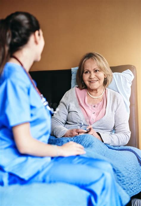 Shell Nurse You Back To Health A Nurse Making Sure A Senior Patient