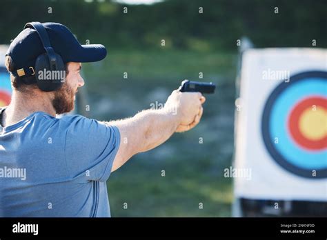 Man Firearm Training And Target For Outdoor Challenge Goals And Aim For Police Army Or