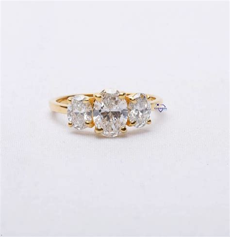 3 Stone Oval Cut Lab Diamond Solitaire Ring In 14 Kt Yellow Gold For
