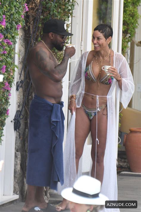Antoine Fuqua And Girlfriend Nicole Murphy Enjoy A Dip In The Pool At