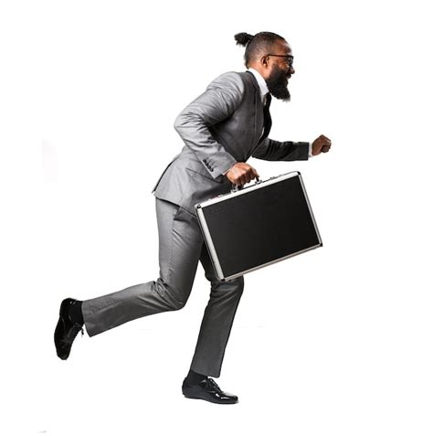 Hombre con traje corriendo con un maletín Descargar Fotos gratis