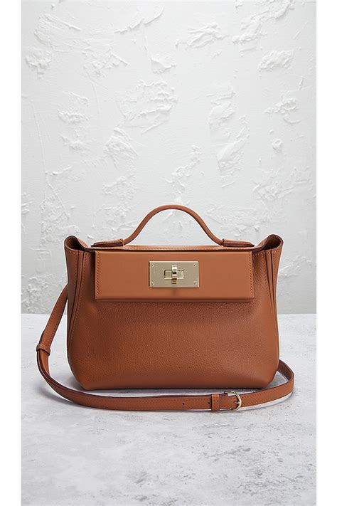 Fwrd Renew Hermes Mini 2424 Evercolor Handbag In Gold Revolve