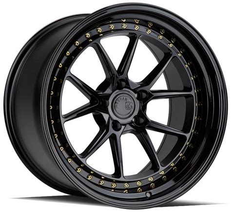 18x105 Aodhan Ds08 Gloss Black W Gold Rivets Flow Formed 5x45114