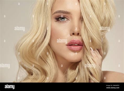 Attractive Female Beauty Model With Luxurious Blonde Hair Close Up Stock Photo Alamy