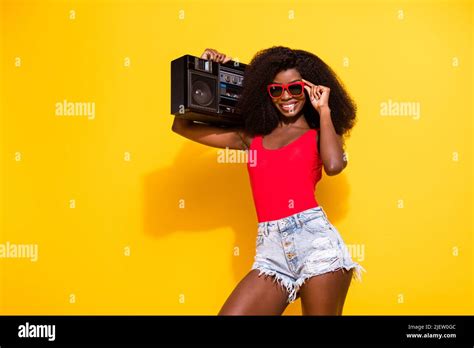 Portrait Of Attractive Cheerful Funky Girl Carrying Boombox Having Fun