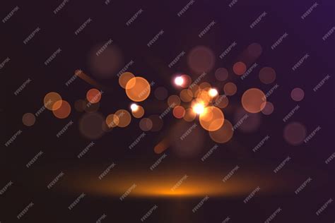 어두운 배경에 Bokeh 조명 효과 무료 벡터