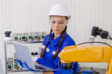 Female Engineer Using Tablet Checking System Robot Arm Automate Robotic Automation In Line