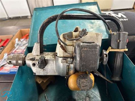 Kioritz Model Edr 2100 Gas Powered Drill With Metal Carrying Case Roller Auctions