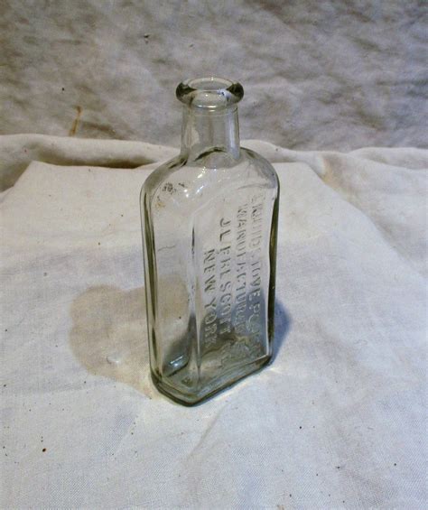Glass Bottle Antique Clear Embossed Bottle Liquid Stove Polish