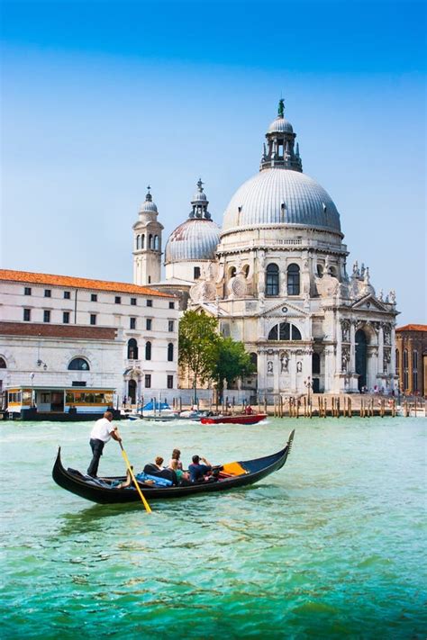 Gondola On Canal Grande With Basilica Di Santa Maria Della Salute
