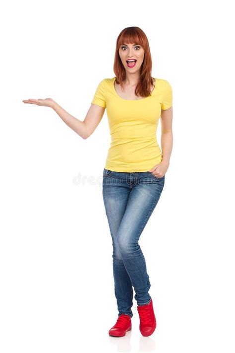 Young Woman Is Holding Hand Raised Presenting Something And Talking