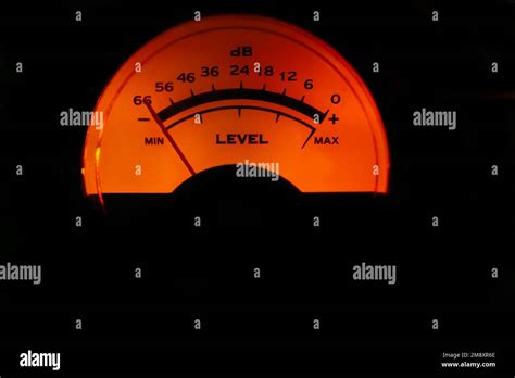 Decibel Meter Of A Sound Amplifier Illuminated Orange On Black