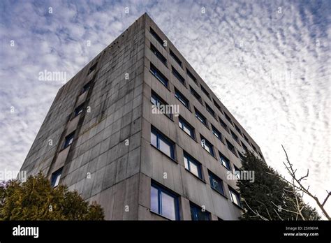 old abandoned office building broken windows in a block of flats
