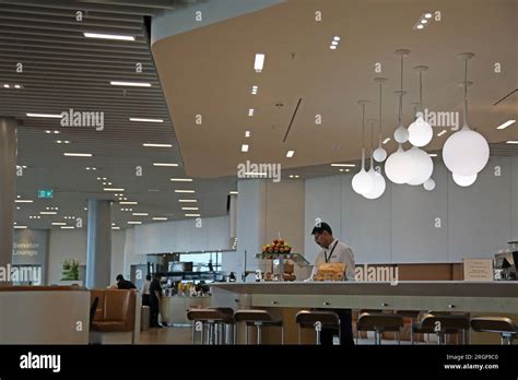 Heathrow Airport Terminal Two Departures Lounge Airport Employee At