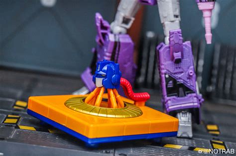 Transformers Generations Comic Book Shockwave And Grimlock In Hand