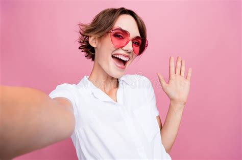 Photo Of Friendly Optimistic Girl Dressed White Shirt In Heart Shape