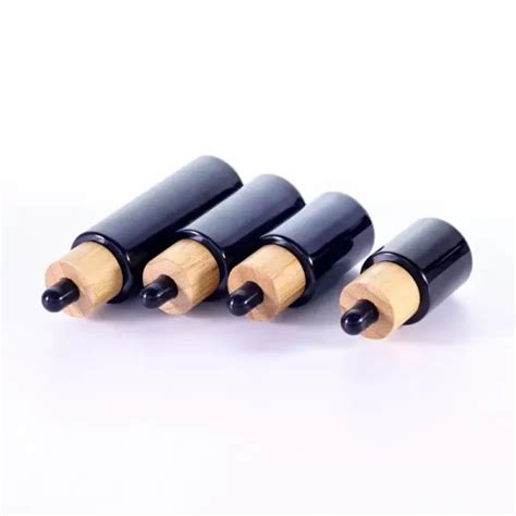 Black Glass Serum Bottle With A Bamboo Dropper Uzone Packaging