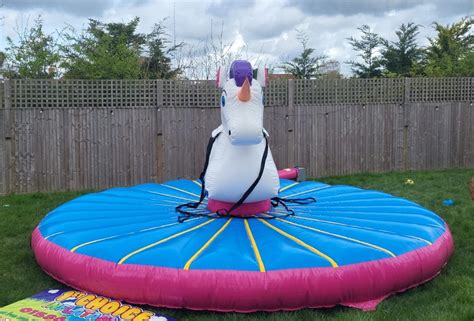 Rodeo Pull Unicorn Themed Inflatable Game 16ft Diameter Bouncy Castle Hire In Kent East