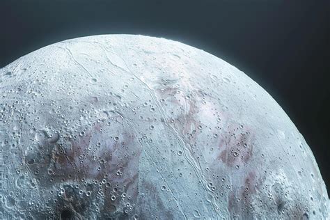Triton Neptunes Largest Moon With Its Pinkish Hue And Icy Surface