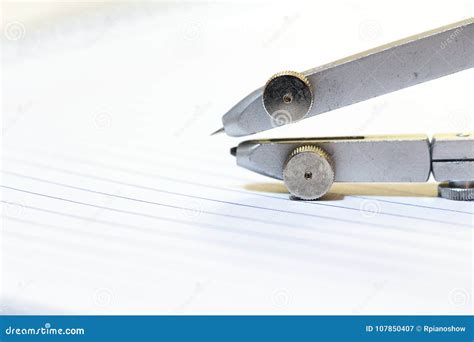 Detail Of A Metal Drawing Drafting Compass On A Paper Sheet Stock Image Image Of Equipment