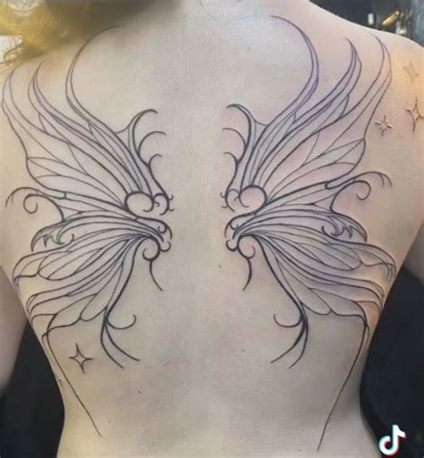 Ripped Fairy Wings Tattoo