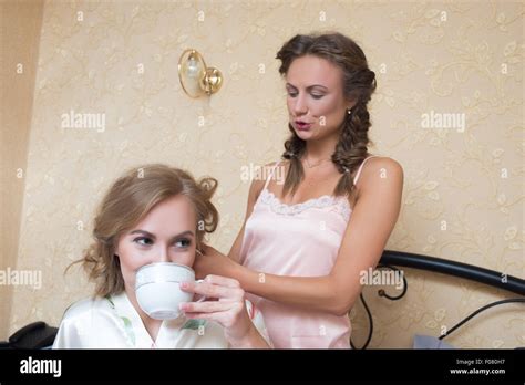 Girl Friends Blond Attractive Young Women Sitting In Bed In Pajamas One